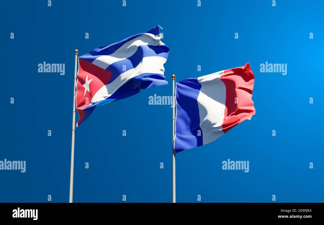 Beautiful national state flags of Cuba and France together at the sky ...