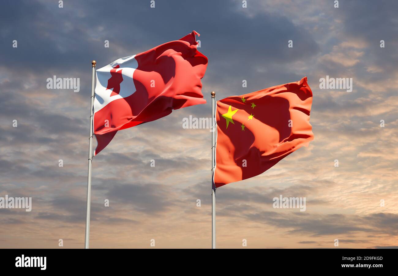 Beautiful national state flags of Tonga and China together at the sky ...