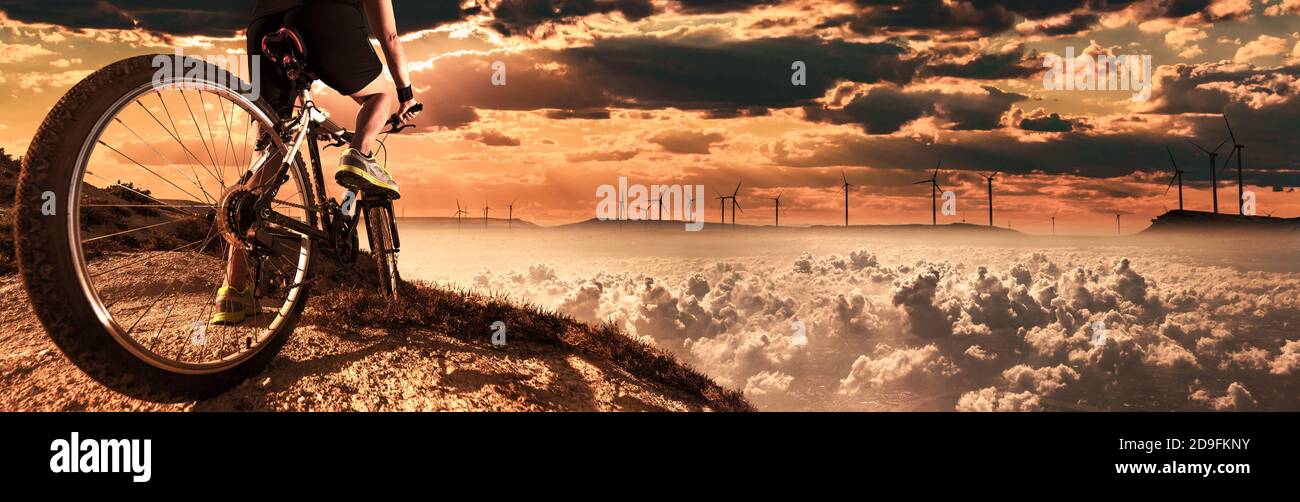 Exercise and healthy lifestyle. Biker and scenic mountain landscape ...