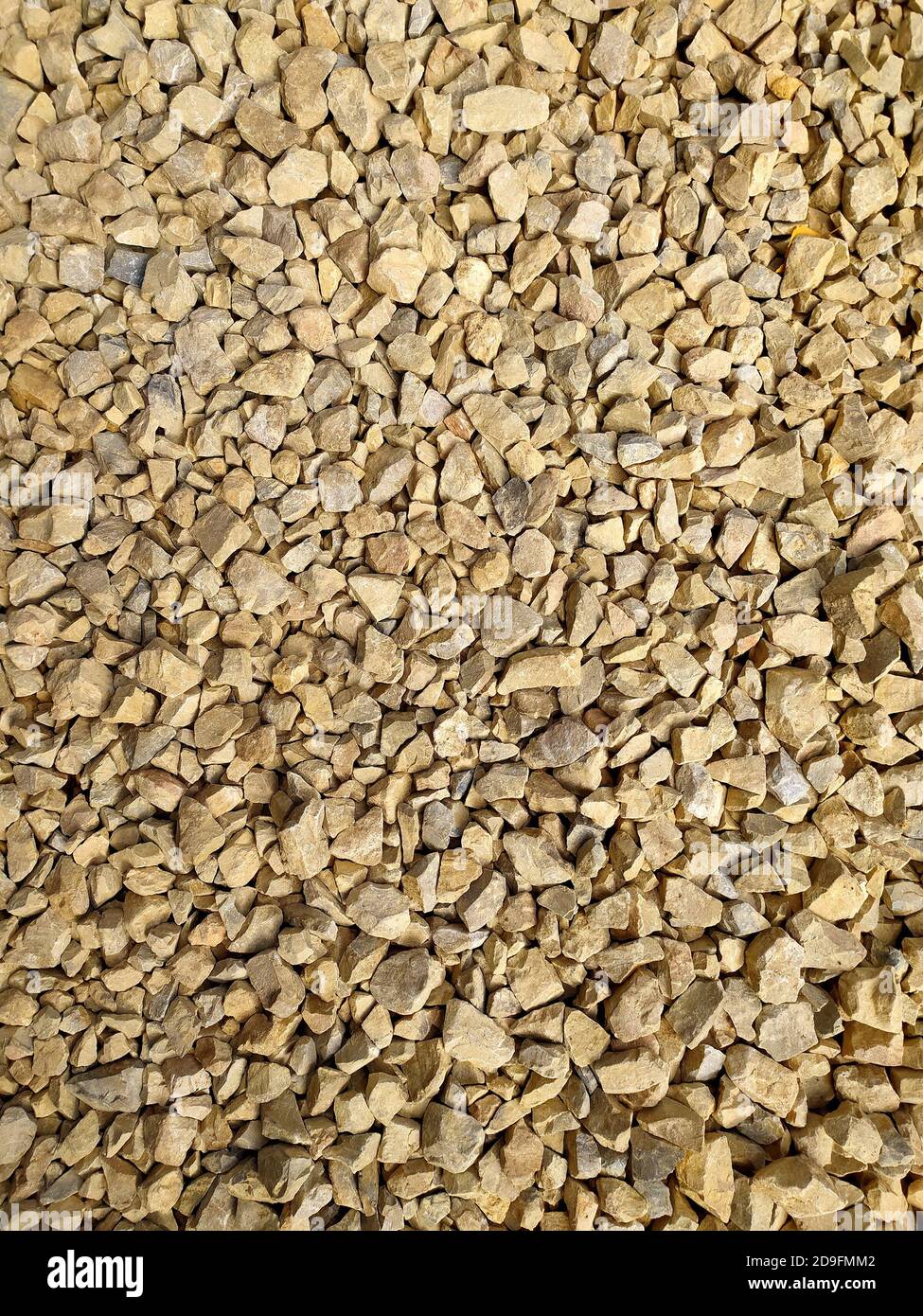 Background of gray gravel. Small stones lie on the ground at a ...