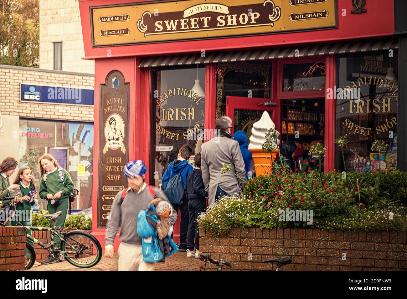 Everyday life. People queuing to Traditional Irish sweet shop Stock ...