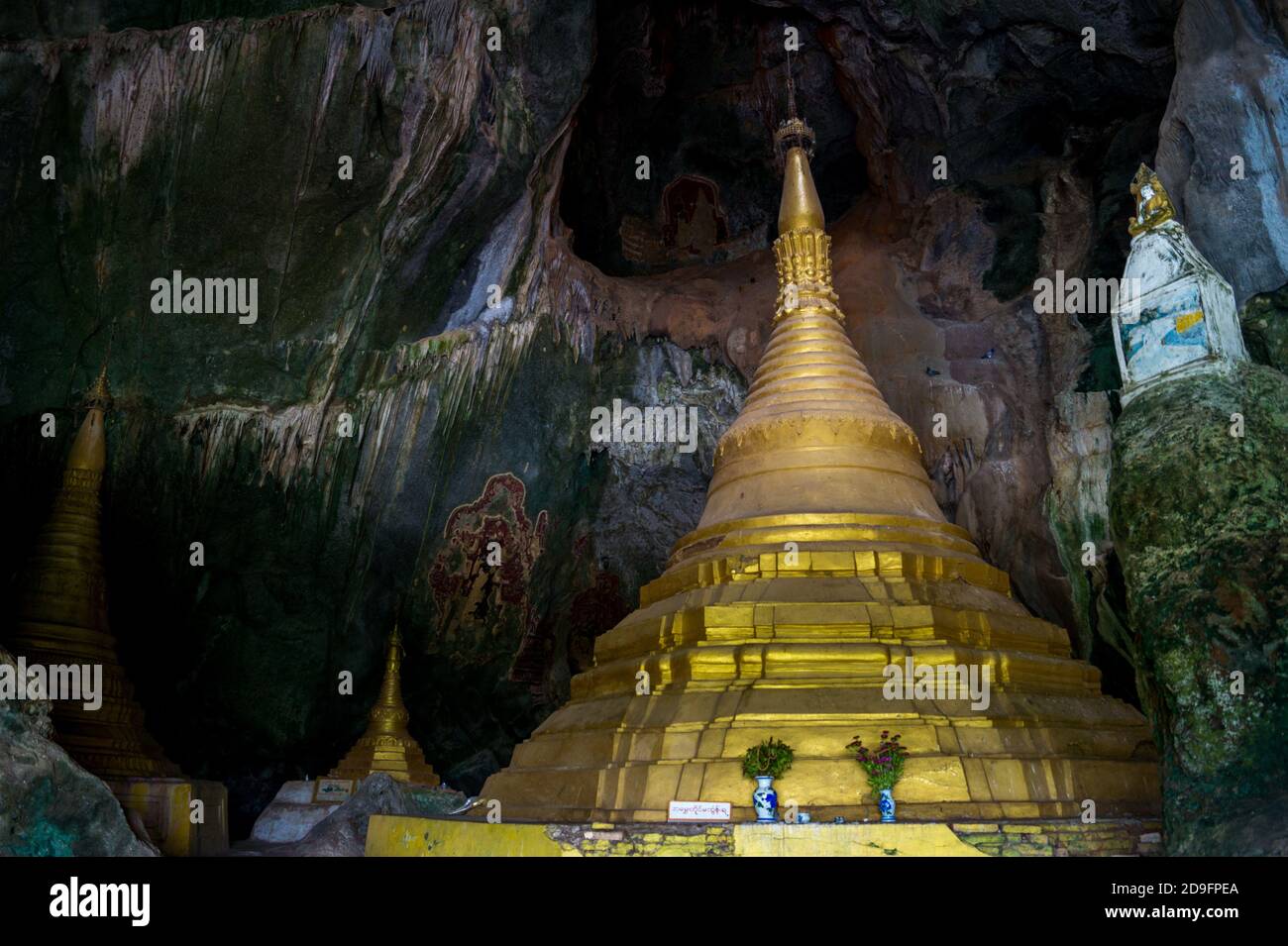 golden pagoda inside a cave Stock Photo - Alamy
