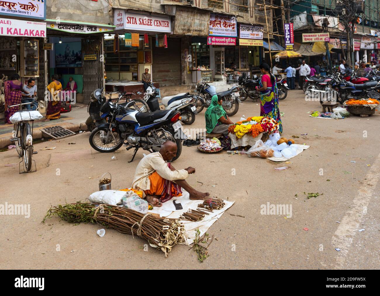 On the street in the holy city of Varanasi, India Stock Photo - Alamy