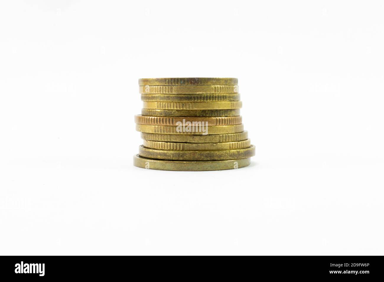Stack of yellow coins isolated on a white background Stock Photo - Alamy