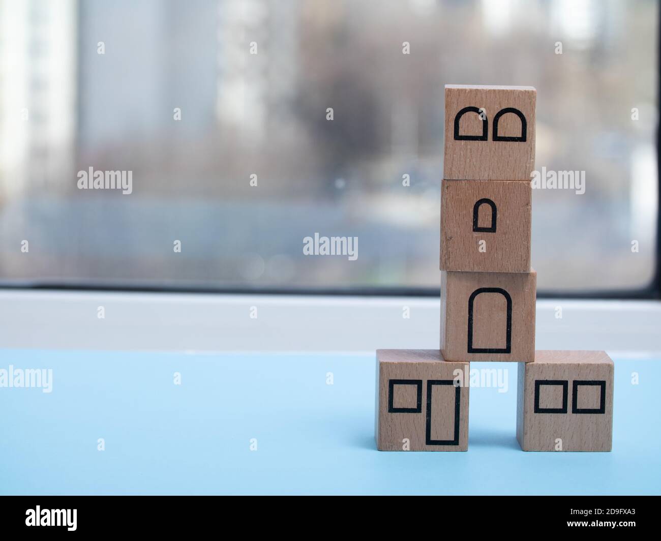 a house built of wooden cubes. concept words on wooden blocks Stock ...