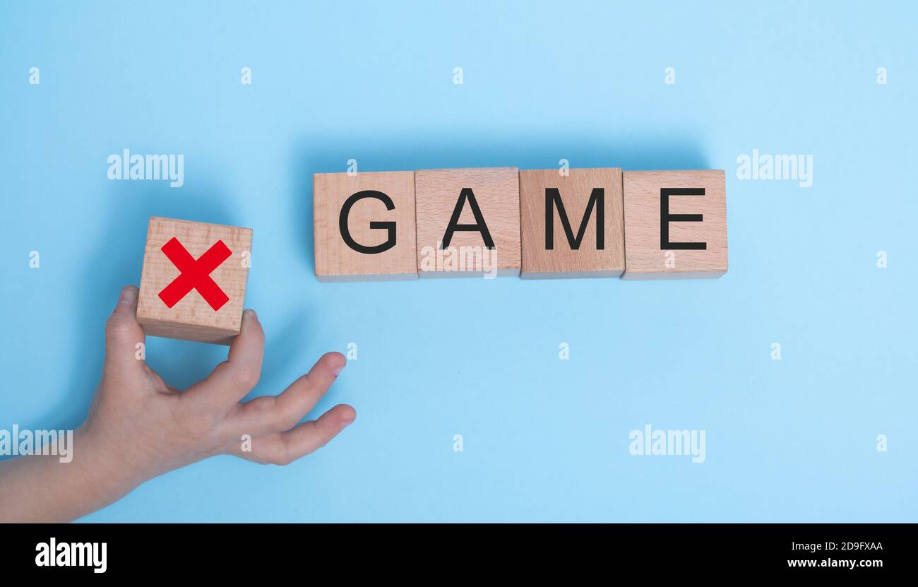 Game word wooden cubes on wooden background, mock up, template, banner ...