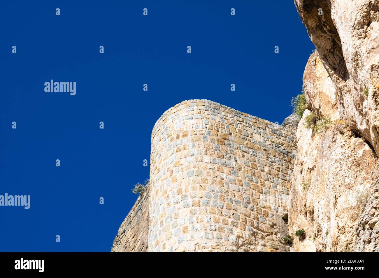 Wall of the tower of a castle Stock Photo - Alamy