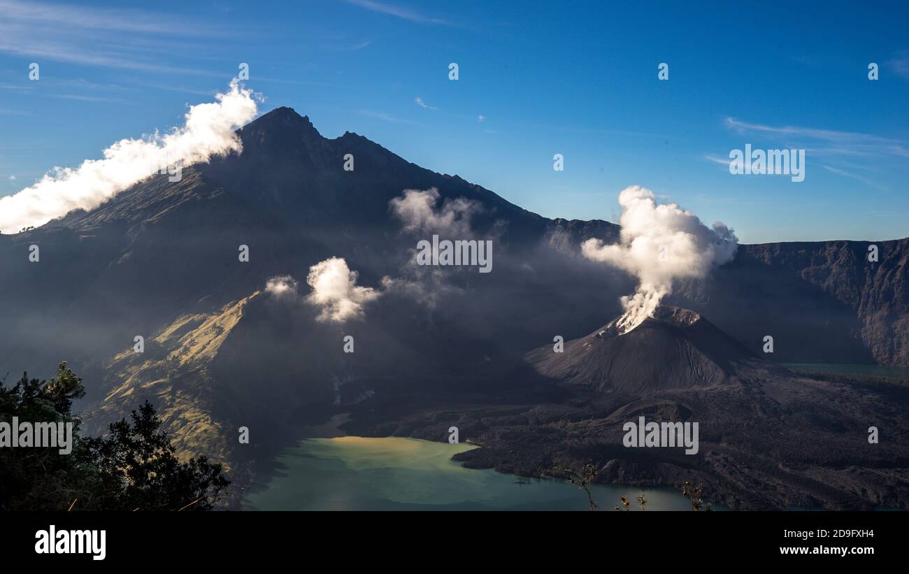 landscape with clouds in the morning, beautiful volcano Rinjani Gurung ...