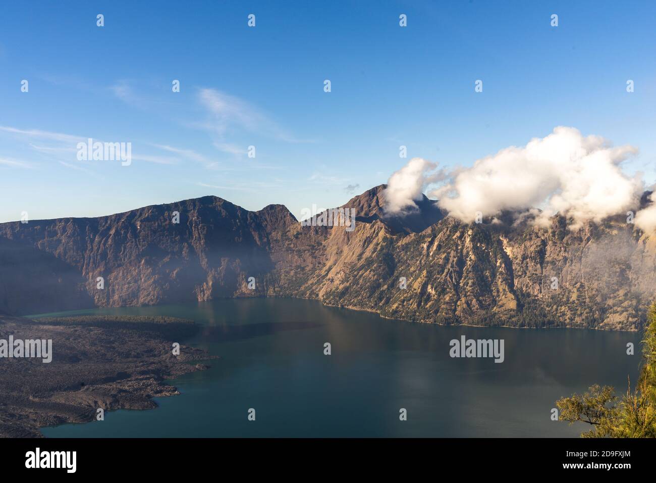 landscape with clouds in the morning, beautiful volcano Rinjani Gurung ...