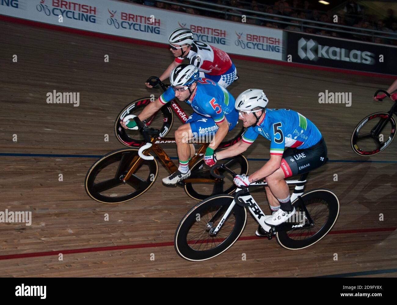 Simone Consonni swings Elia Viviani in to the race. Riders were taking ...