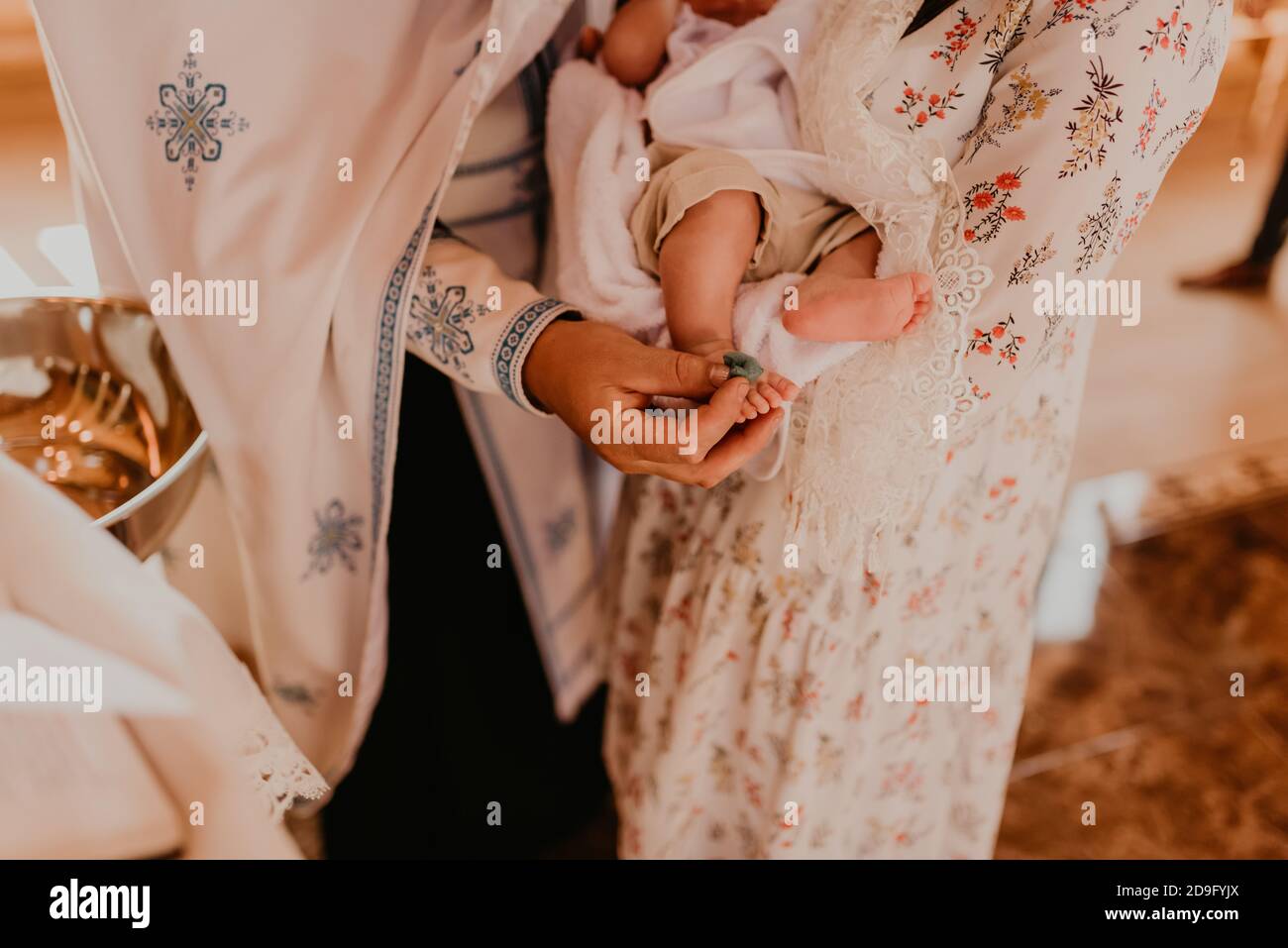 rite of sacrament of epiphany child baby in church Stock Photo - Alamy