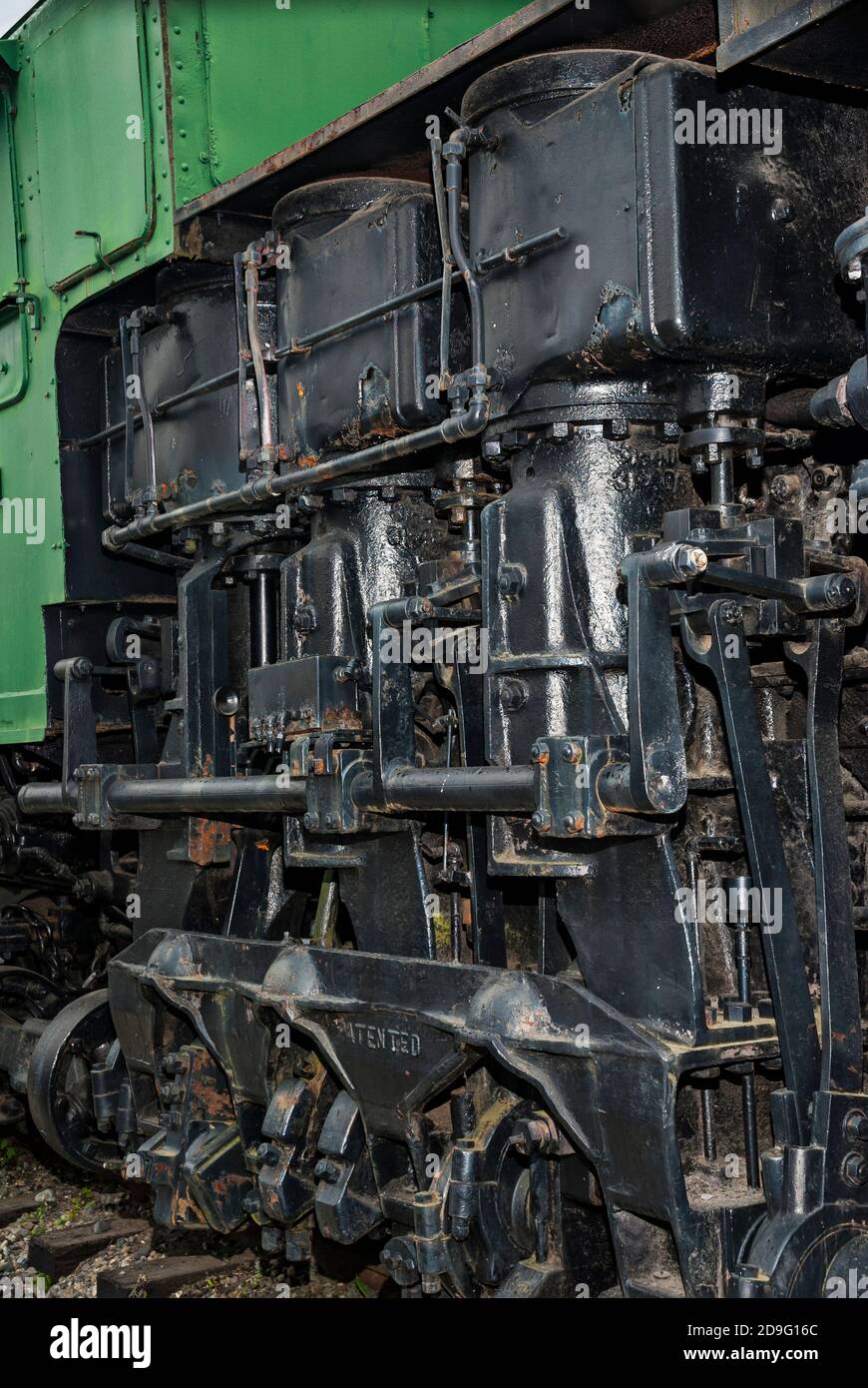 Detail of an old steam locomotive displayed on a section of track in ...