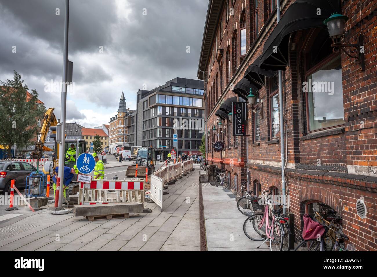 Construction worker on street in Aarhus, Denmark Stock Photo - Alamy