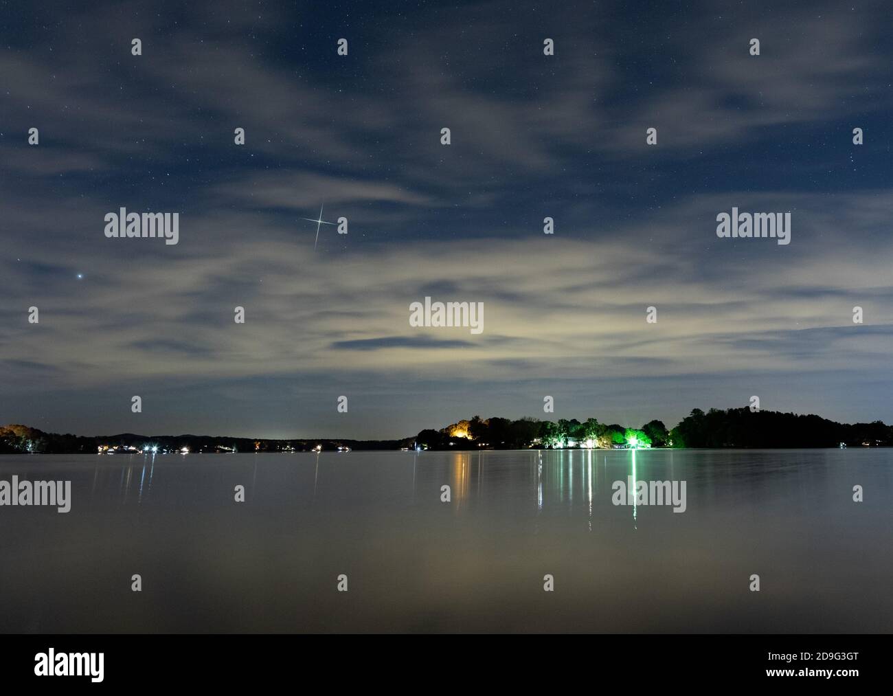 Bright star on Christmas Eve rising over Tillery Lake in North Carolina ...