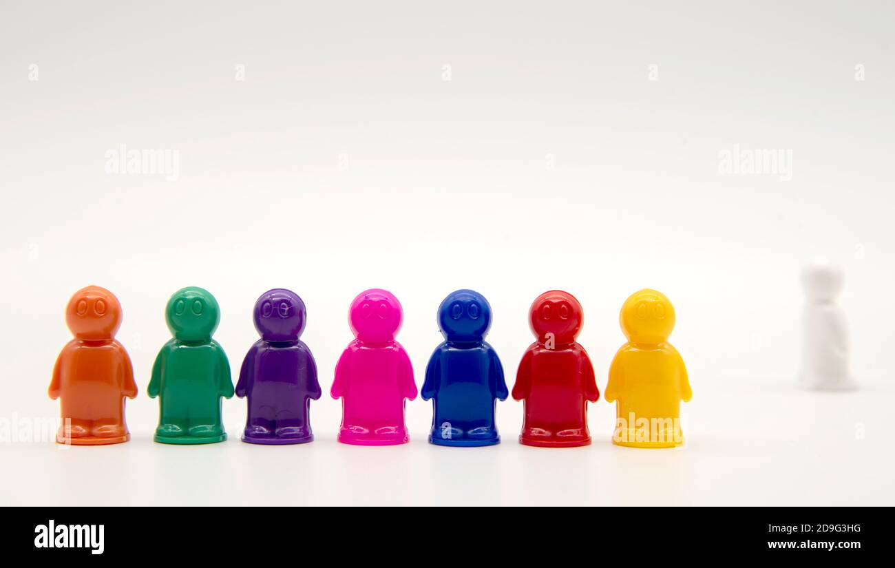 Small plastic men on a white background Stock Photo - Alamy