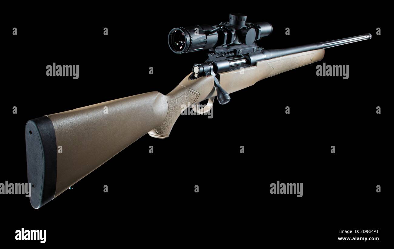 Bolt action hunting rifle on a black background with a high powered ...
