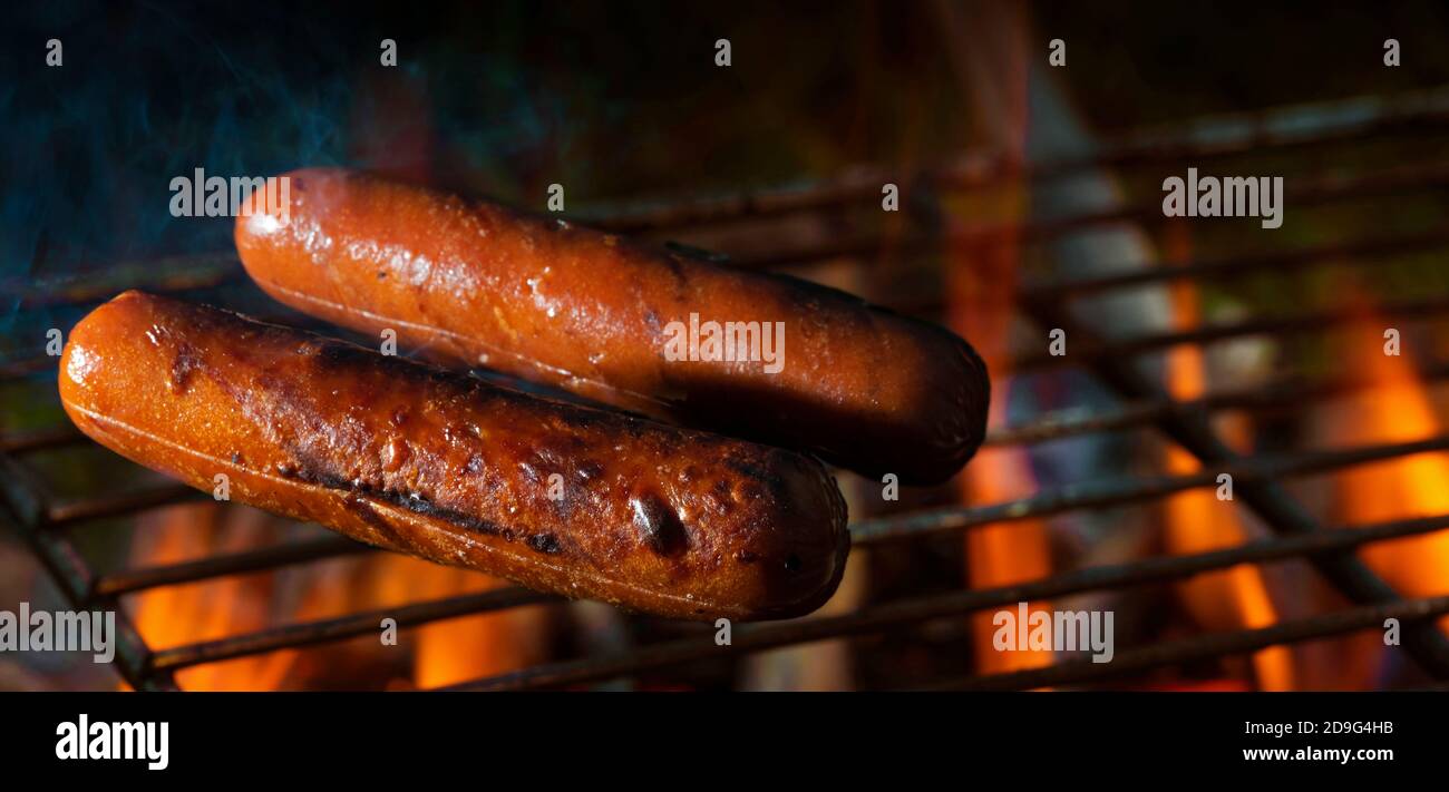 Cooking hot dogs over fire hi-res stock photography and images - Alamy