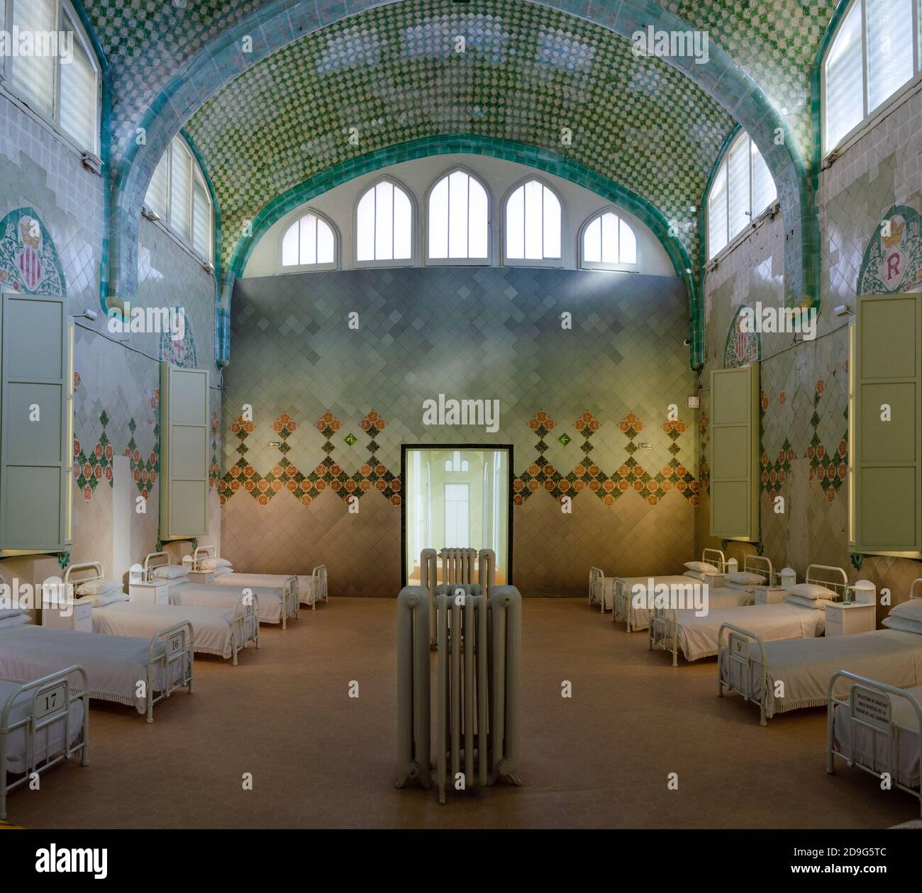 Old hospital with white beds and walls with ornaments Stock Photo - Alamy