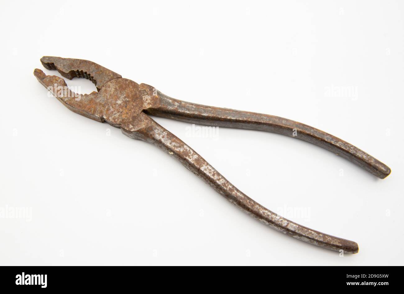 Old rusty pliers on a white background Stock Photo - Alamy