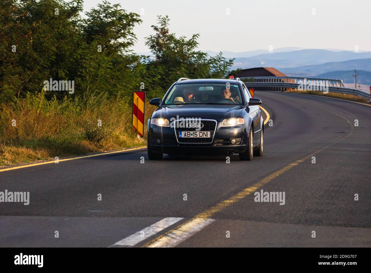 Traveling car in motion on asphalt road, front view of car on street ...