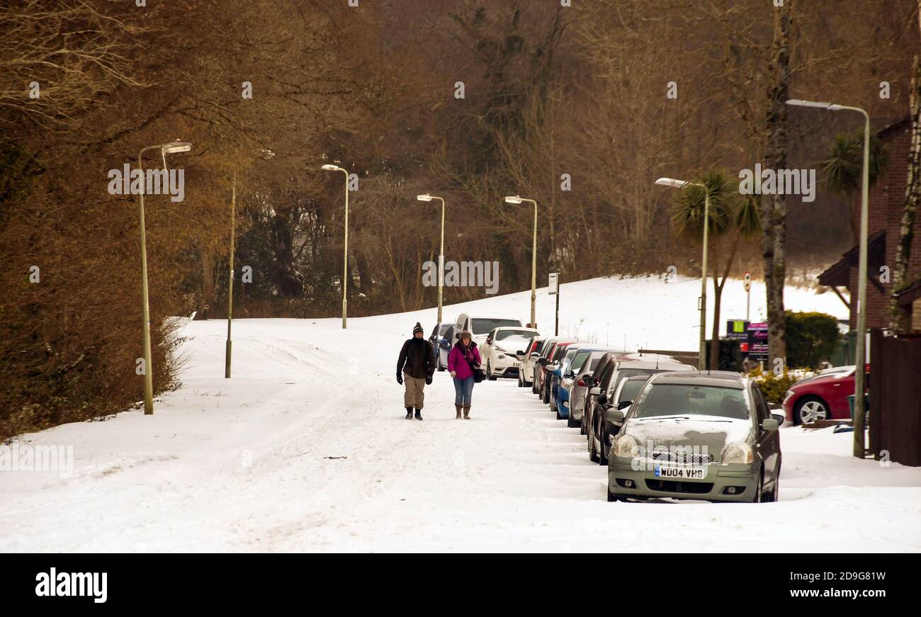 Pontypridd, Wales - March 2018: Snow covered street with cars parked on ...