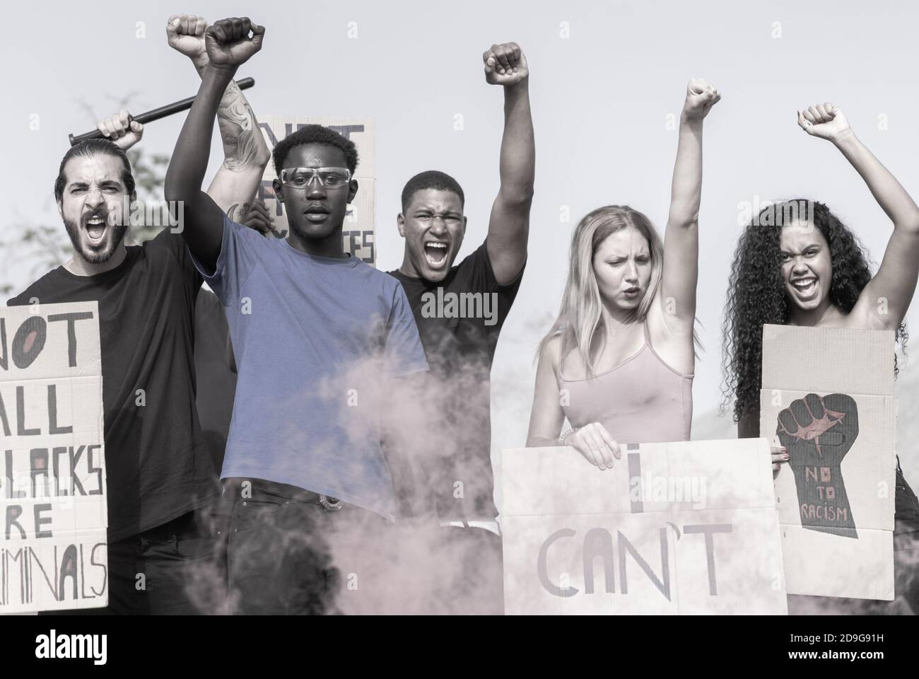 Small activist group going against police throwing tear gas ...