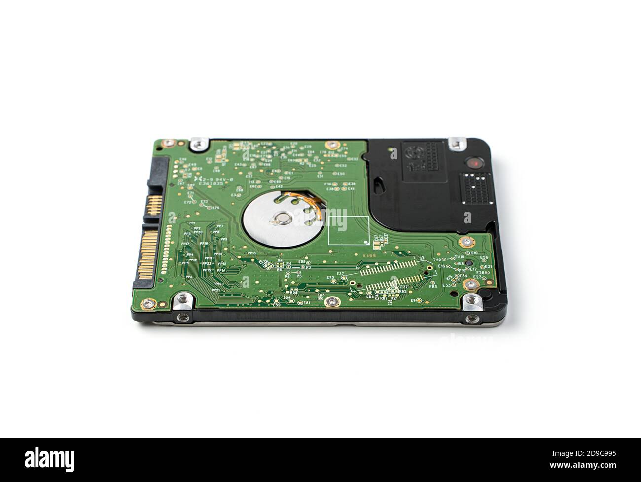 Disassembled HDD on a white background. Side view Stock Photo - Alamy