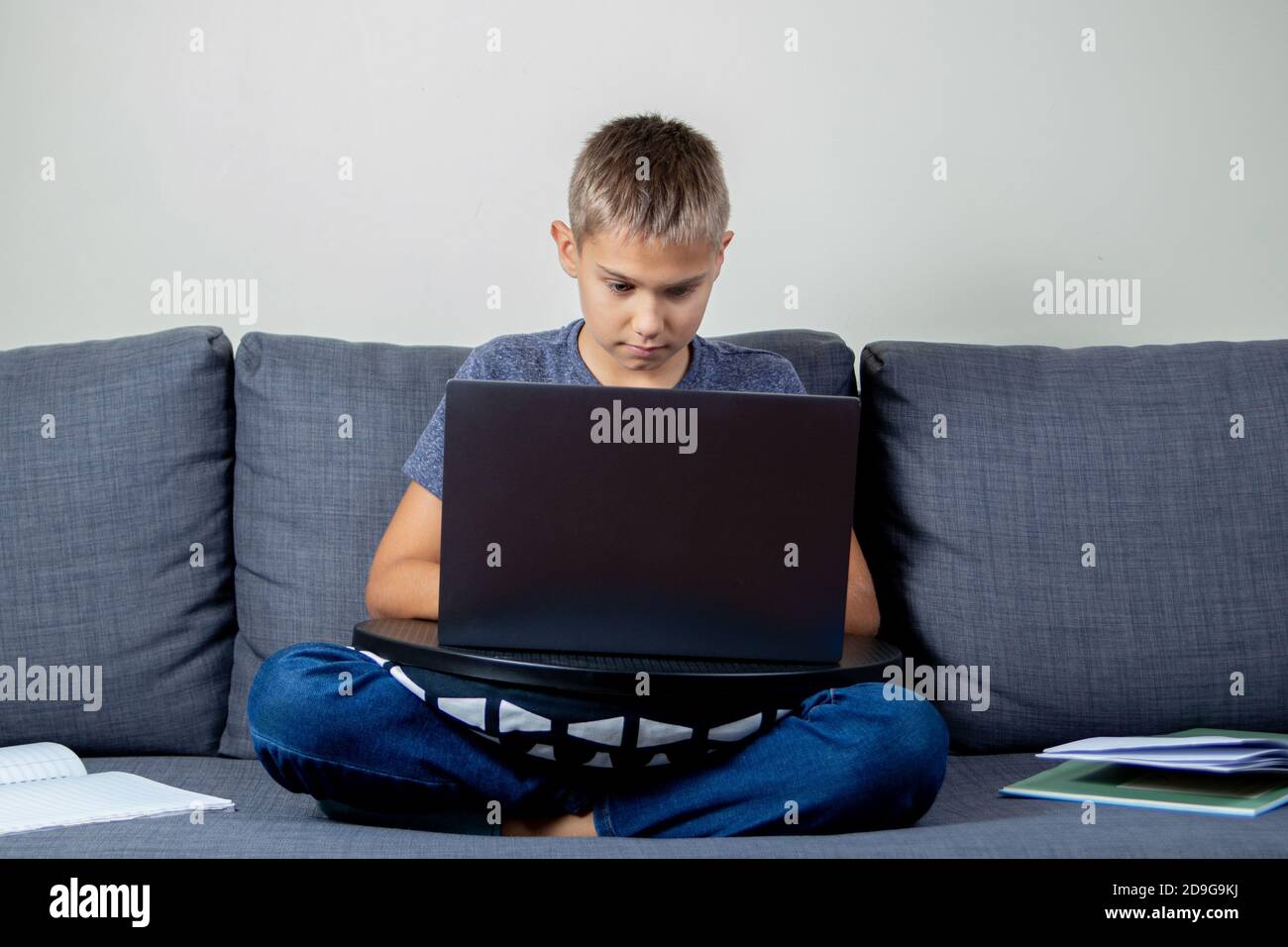 Child using laptop computer at home. Technology, online learning ...