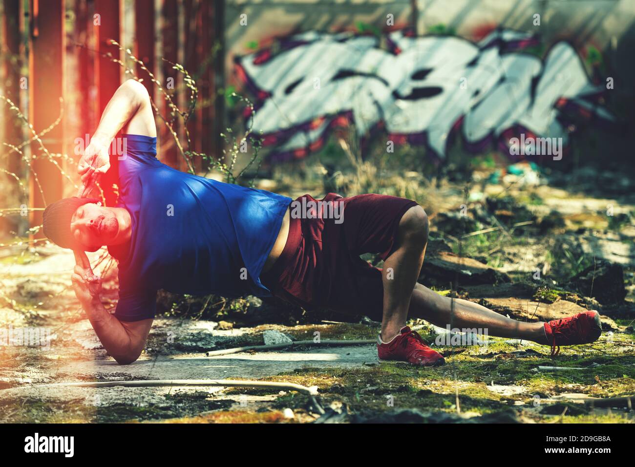 Handsome Man Keeping Balance On Hands in Warehouse - Muscular Athletic ...