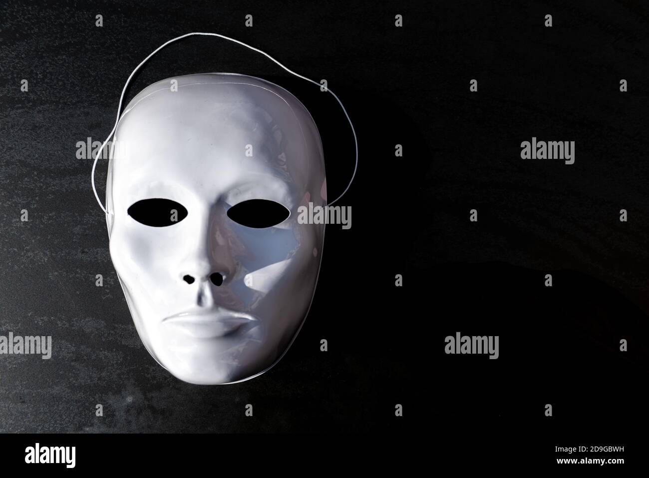 White theatrical mask on the black background Stock Photo - Alamy