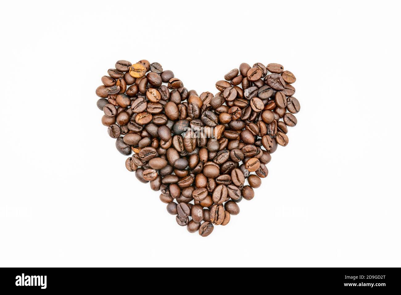 Coffee beans heart shaped isolated on white background Stock Photo - Alamy