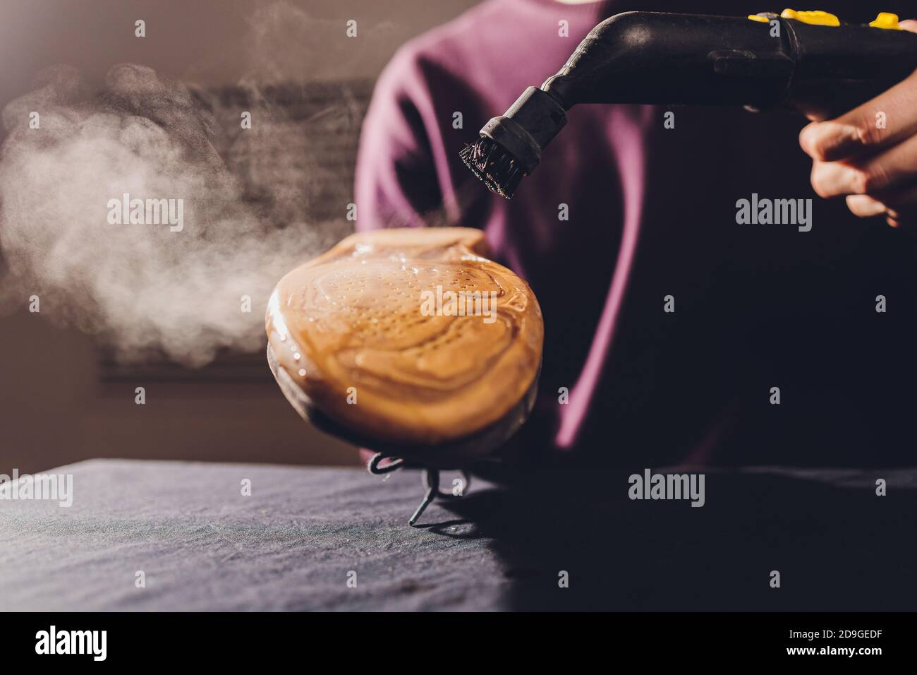washing the dirty cleaning the shoes with a steam cleaner Stock Photo ...