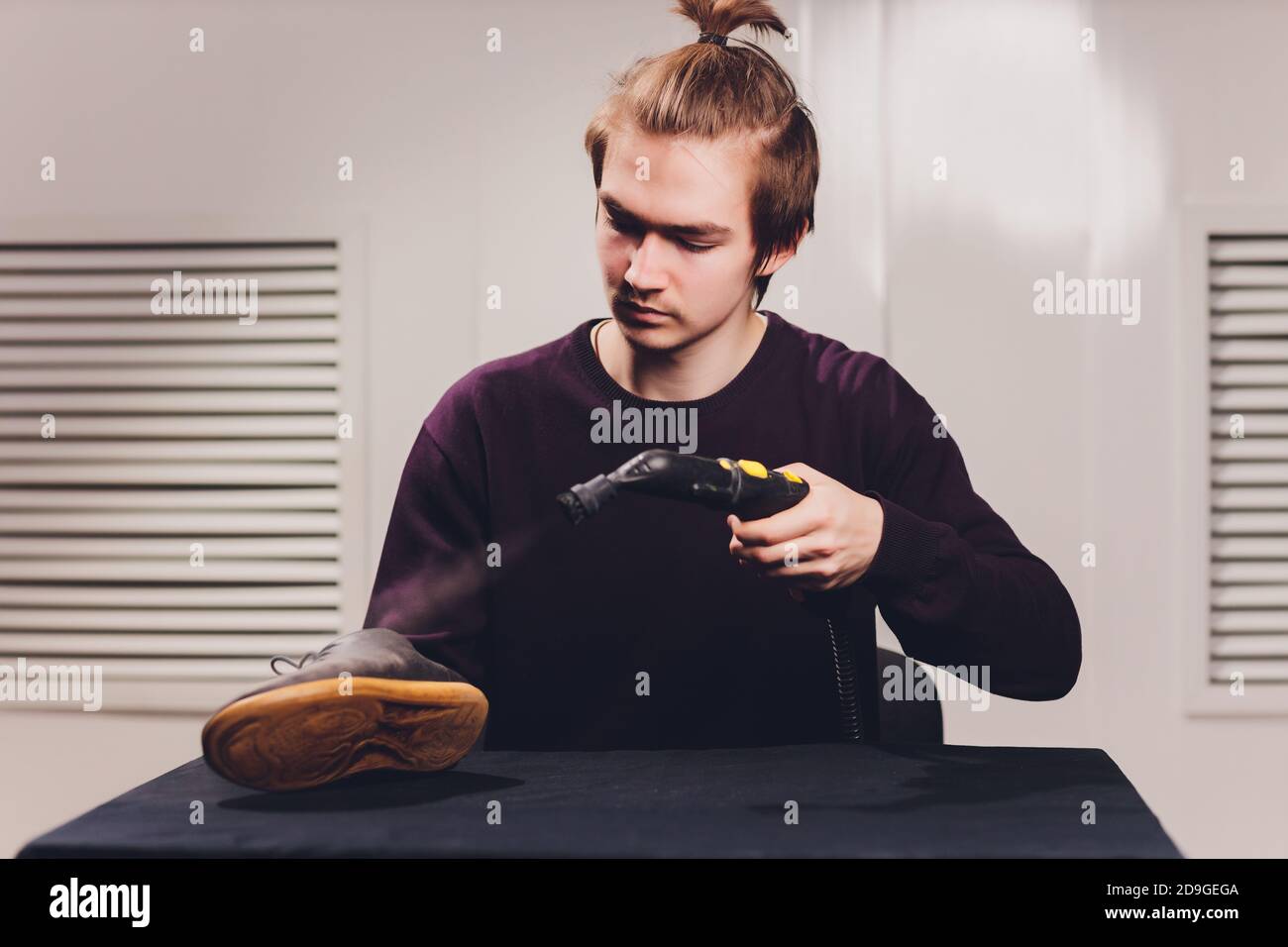 washing the dirty cleaning the shoes with a steam cleaner Stock Photo ...