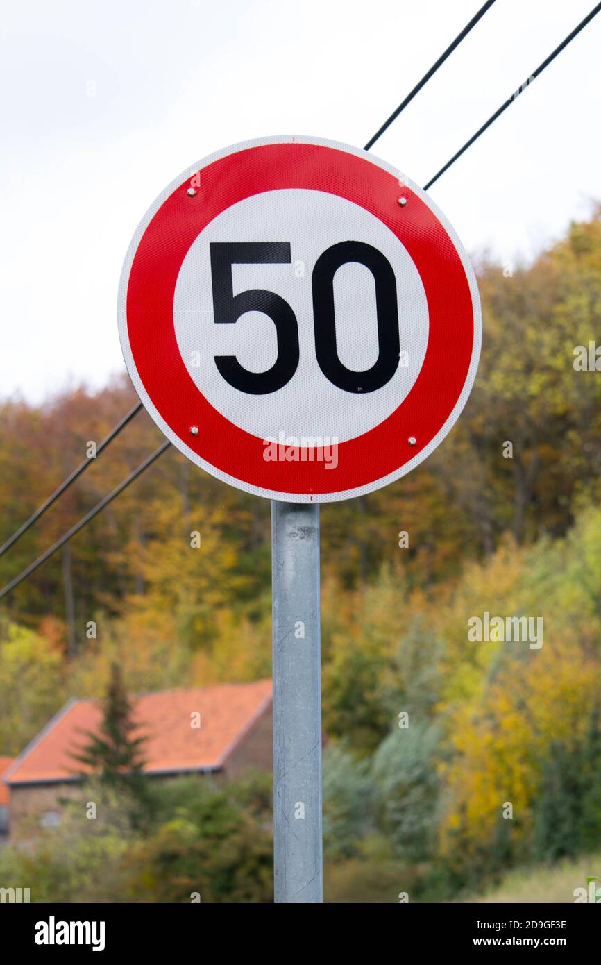 Vertical shot of a speed limit traffic signal at 50km per hour Stock ...