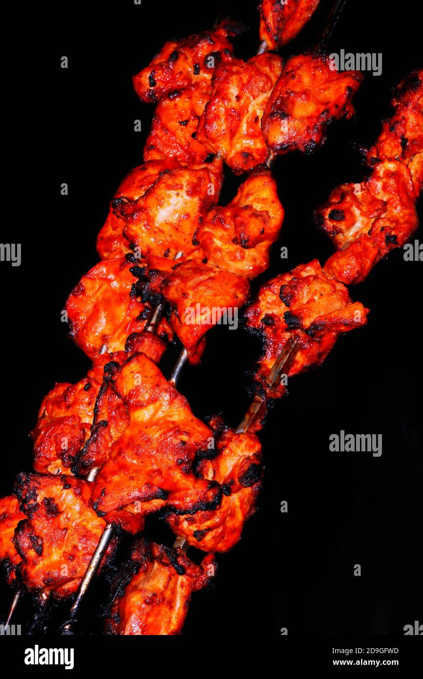 chicken tikka isolated with black background, indian food Stock Photo ...