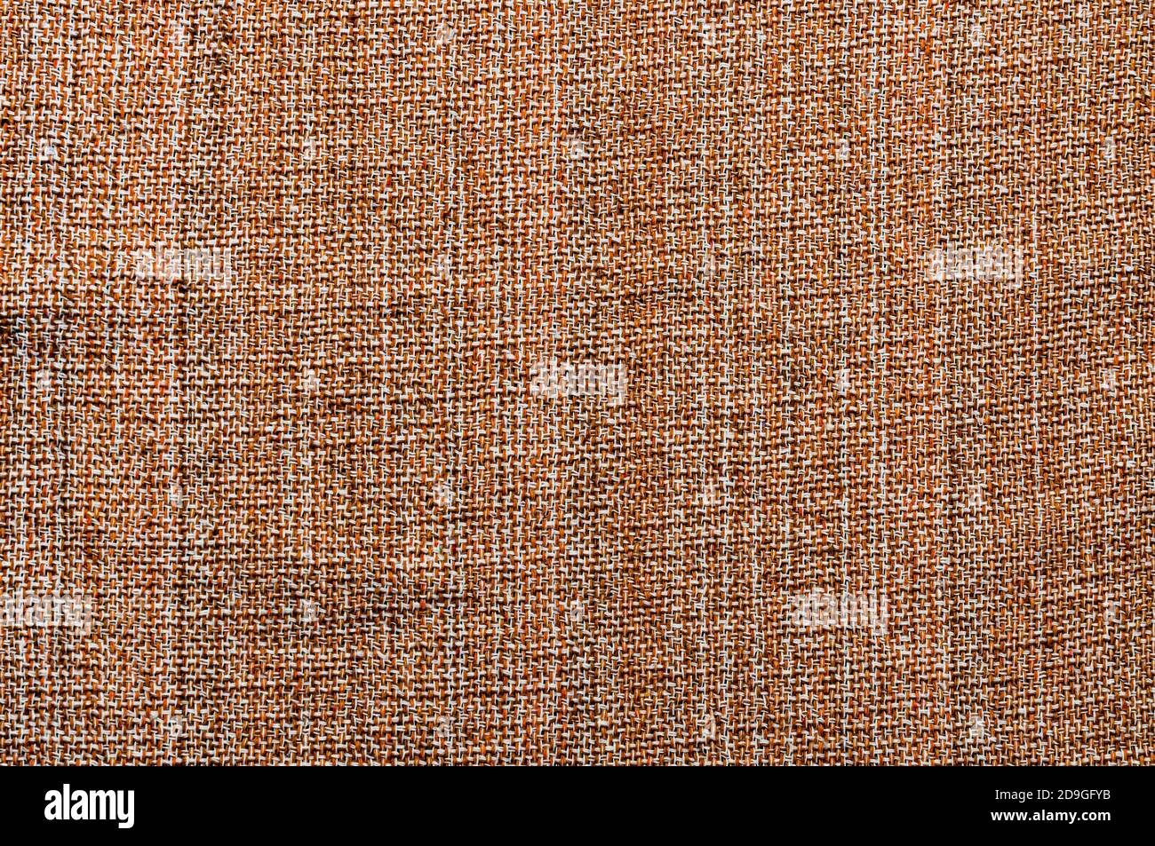 Brown textile fabric background. close up of brown fabric cloth made of ...