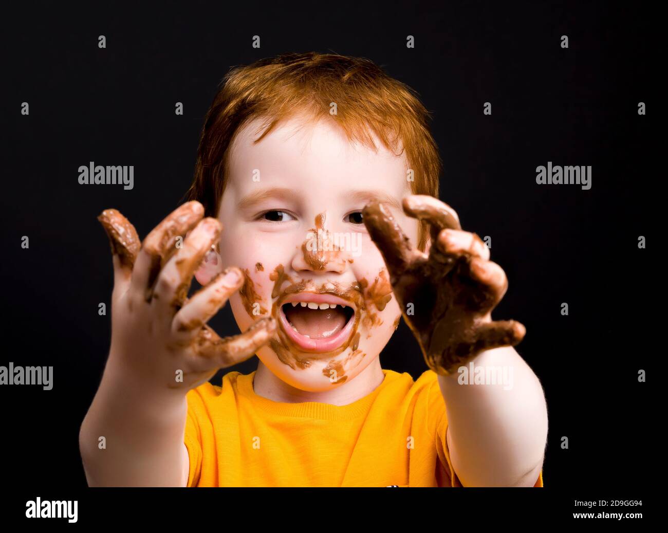 boy smeared in milk chocolate Stock Photo - Alamy