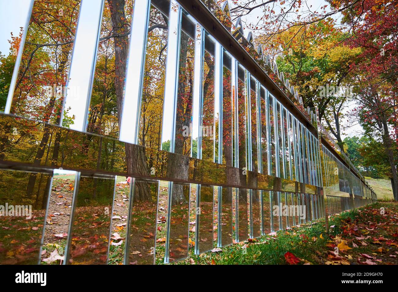Alyson Shotz's Mirror Fence sculpture, a play on the traditional white ...