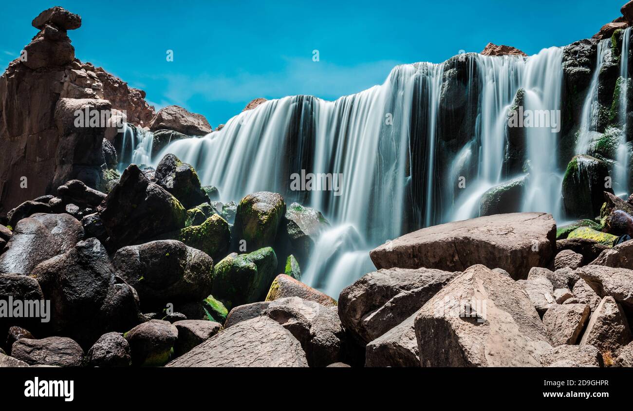 Breathtaking shot of the Pillones Waterfall and Stone Forest of Imata ...