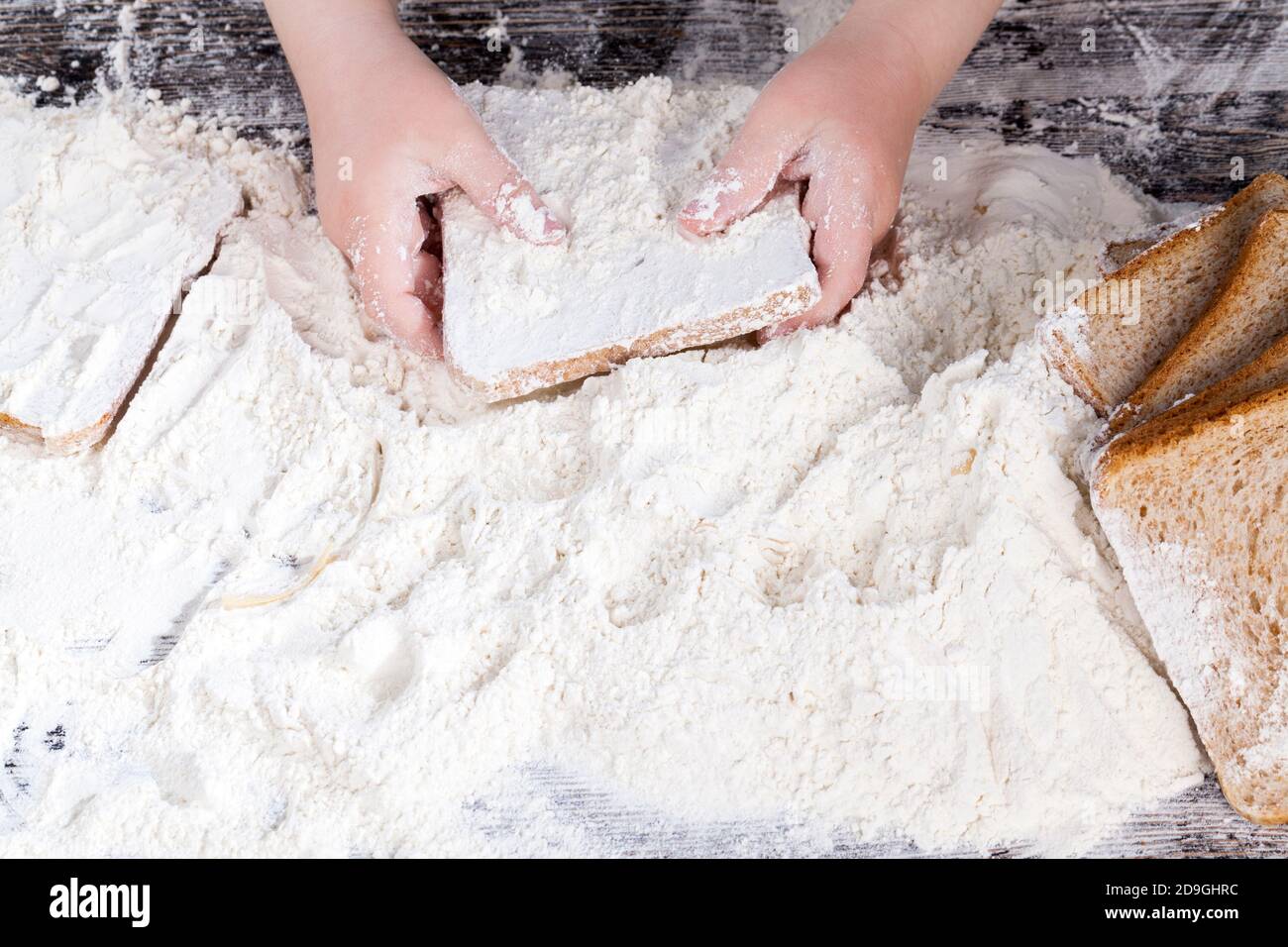 work in the kitchen with wheat flour Stock Photo - Alamy