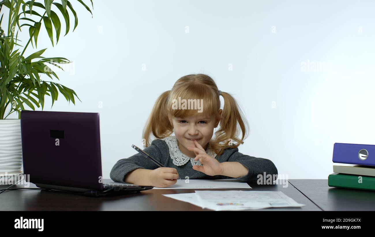 Preschool child girl distance online learning at home. Cute kid ...