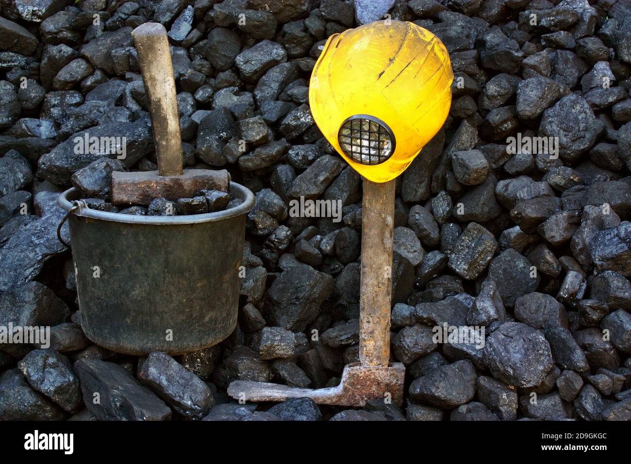 Mining tools on a background of coal Stock Photo - Alamy