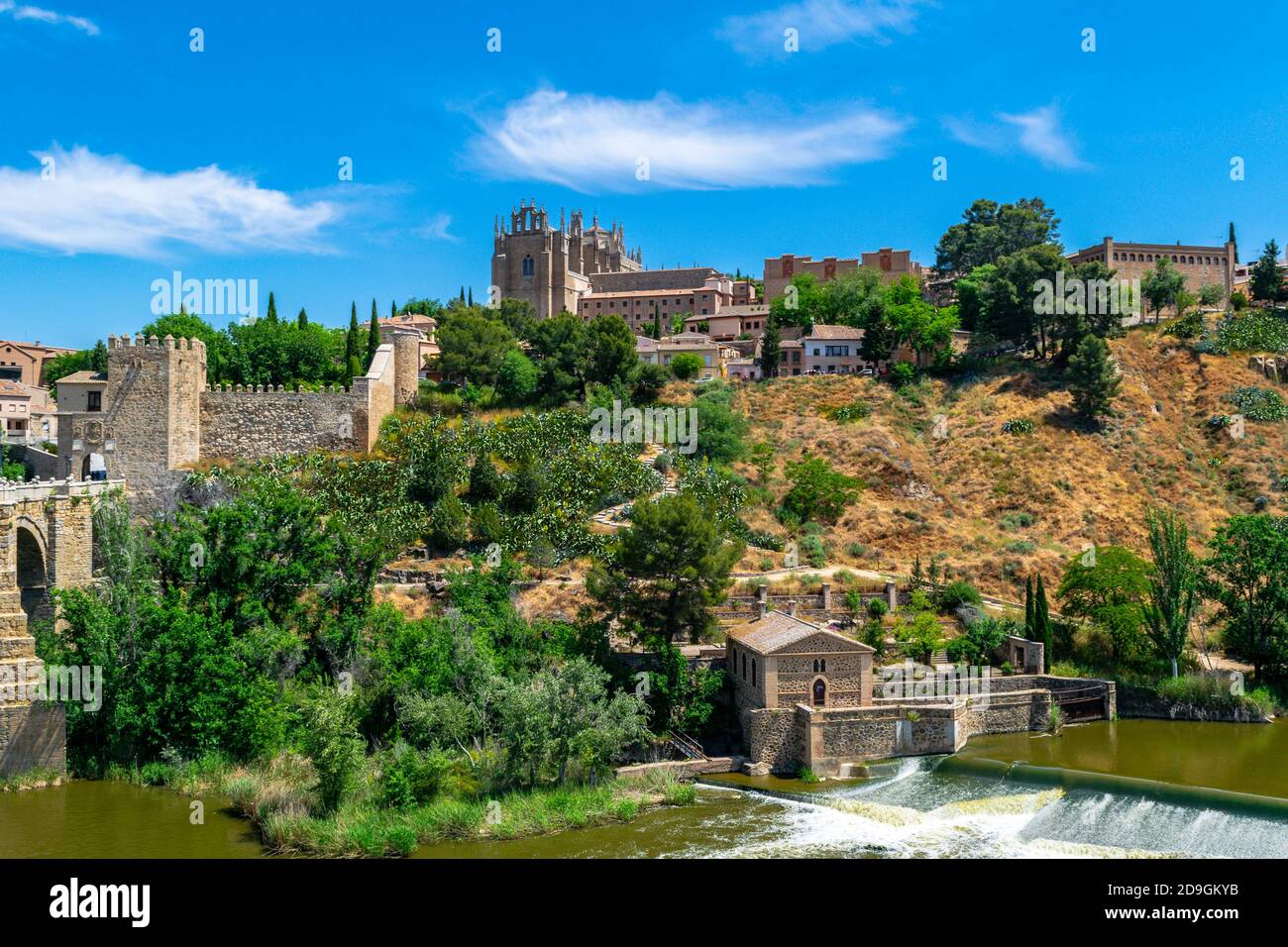 View of Toledo from the road near the Puente de San Martín Bridge ...