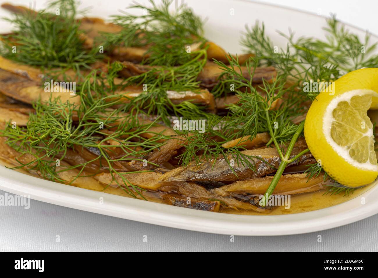 Closeup of a traditional Turkish appetizer meze Ciroz served on a white ...