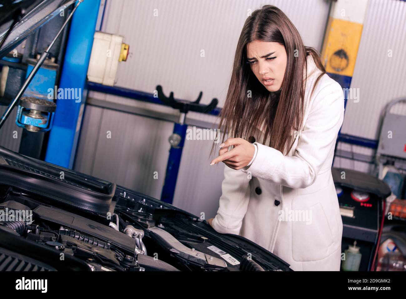 Female customer at repair shop Stock Photo - Alamy