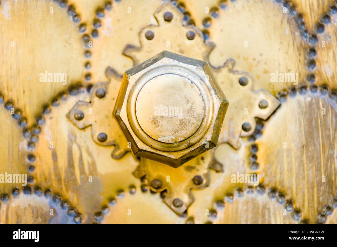 Detail of a golden metallic door Stock Photo - Alamy