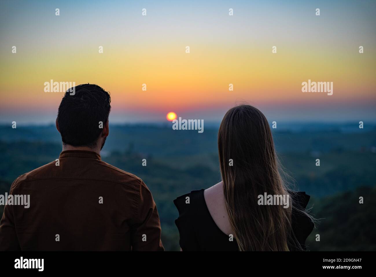Man watching sunset from mountain hi-res stock photography and images ...