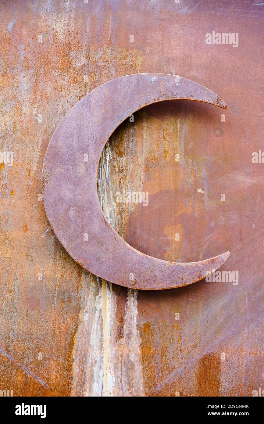Vertical closeup of a rusted moon on a grunge wall Stock Photo - Alamy