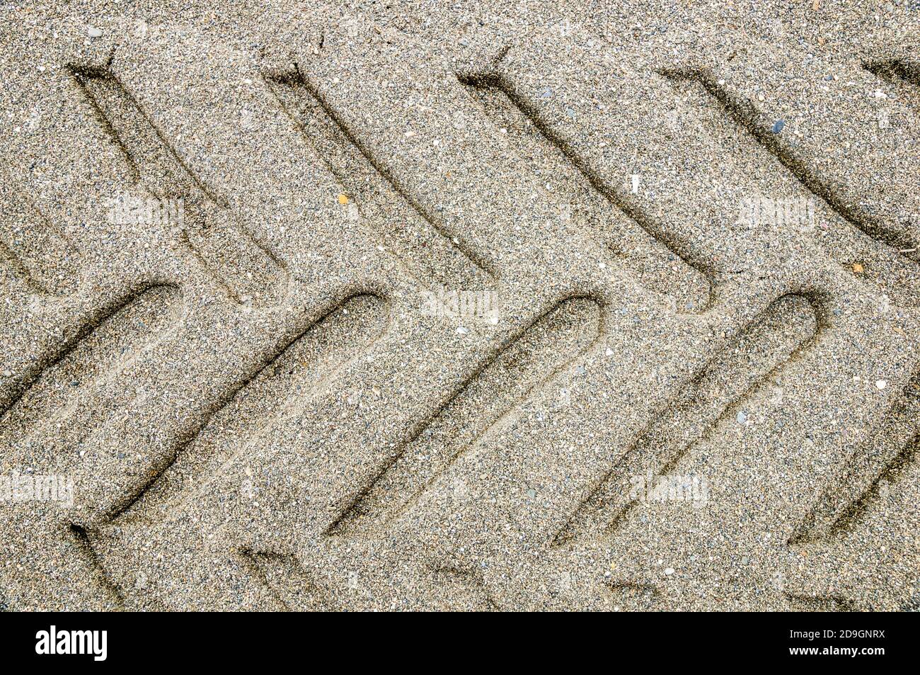 Closeup top view shot of a tractor wheel track Stock Photo - Alamy