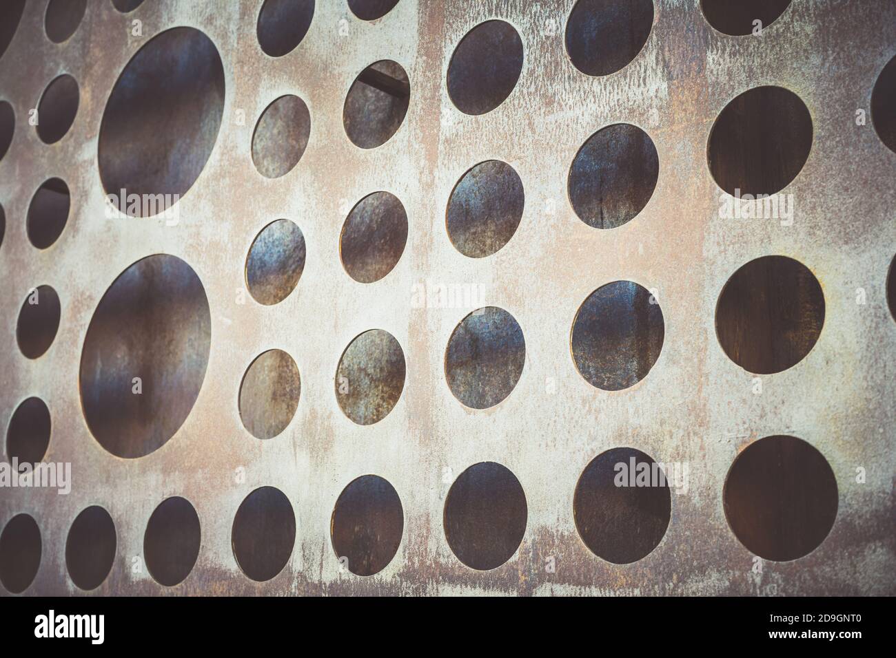 Rusty metallic texture with round holes Stock Photo - Alamy